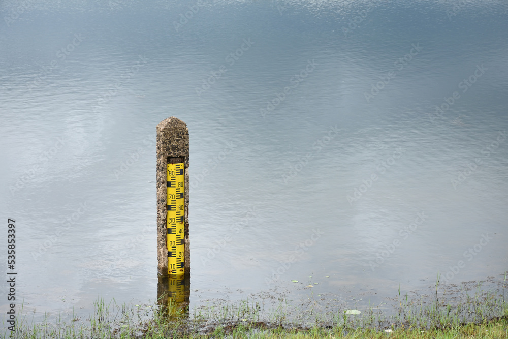 water meter pole in the river to measure the water level. Stock Photo ...