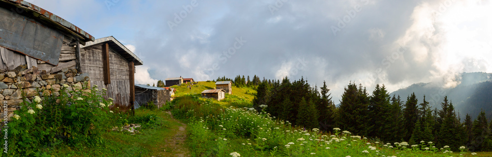 Traditional wooden houses at highlands. Landscape photo was taken in ...