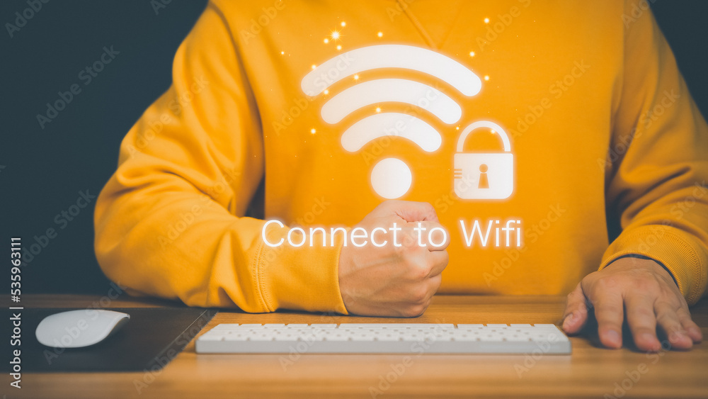 Man Using A Computer Keyboard To Connect To Wifi And Waiting To Loading