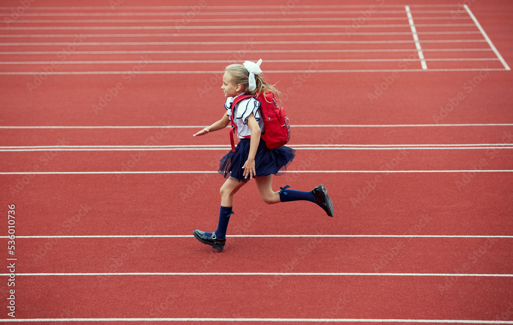 Start. Back to school, kids and education concept. Girl dressed in ...