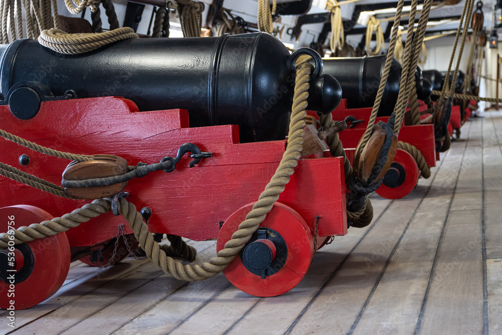 Historirical retro metal cannon inside battle sailing vessel Stock ...