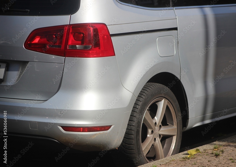 Silver mini van truck parked on side street/ Parked car. Car background ...