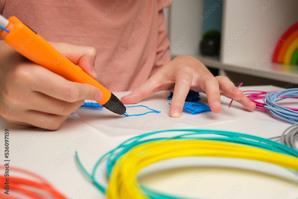 Teen Girl Using 3d Pen. Printing with Colored Plastic Wire Filament ...