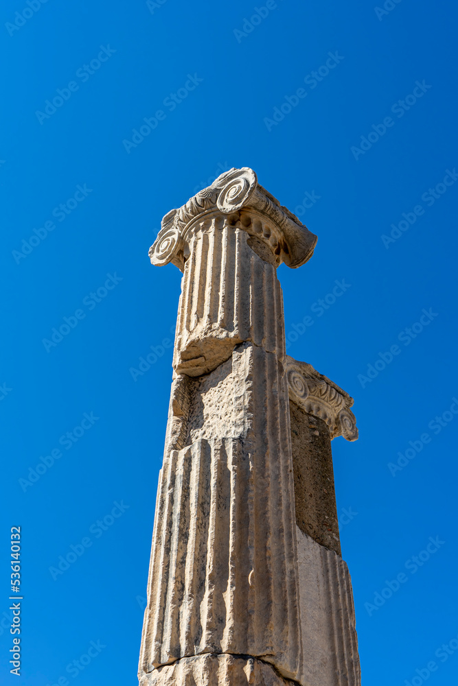 Two ionic columns of the Basilica Stoa in the ancient city Ephesus with ...