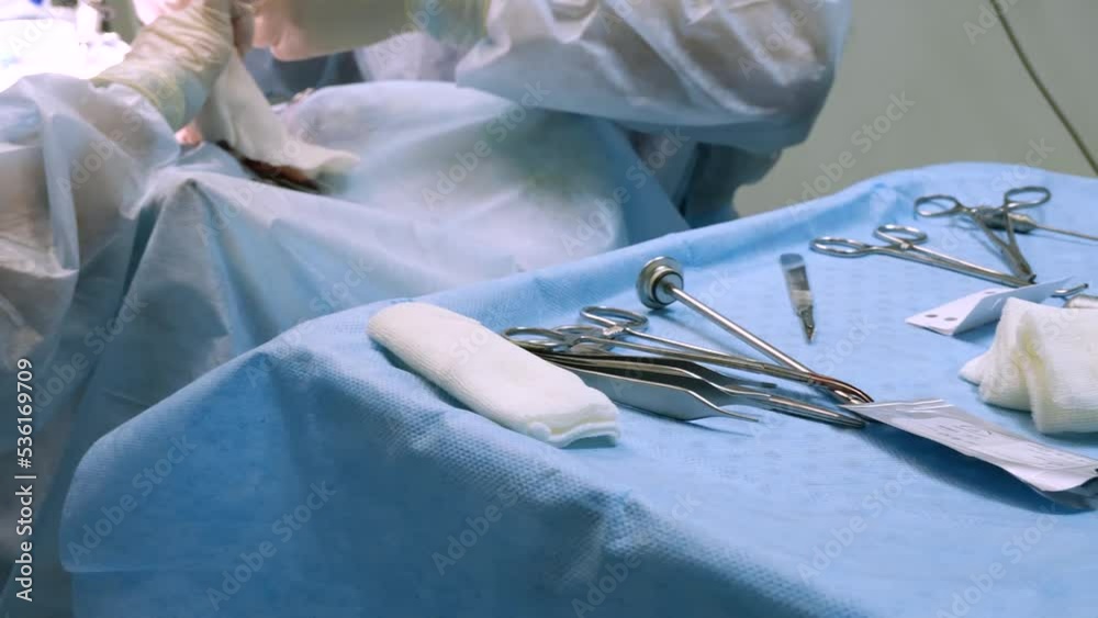 There are surgical instruments on the table. The surgeon's cookies dare ...
