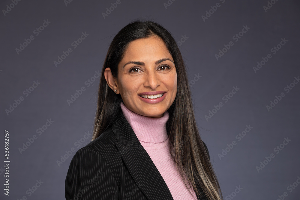 Studio headshots of beautiful Asian Indian woman in business attire on ...