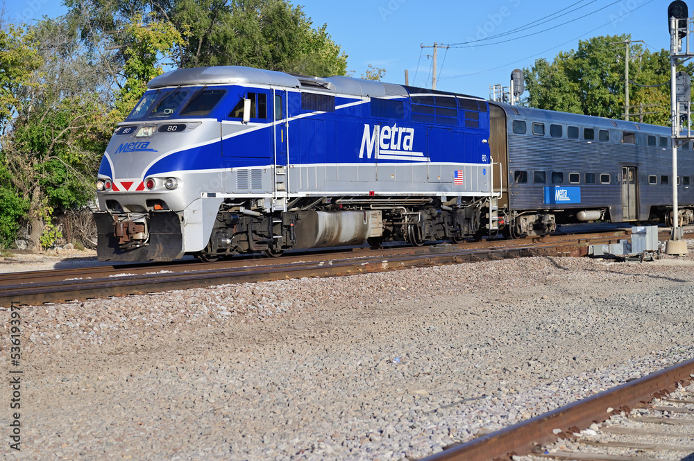 A Metra commuter train traveling toward its destination outbound from ...