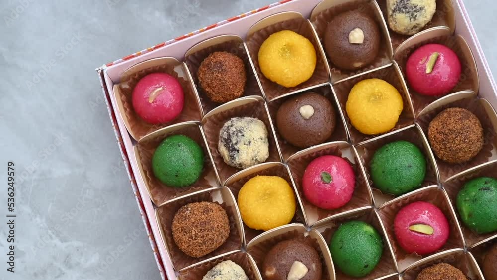 Colourful Diwali sweets pack, Indian sweet festival dish called mithai ...