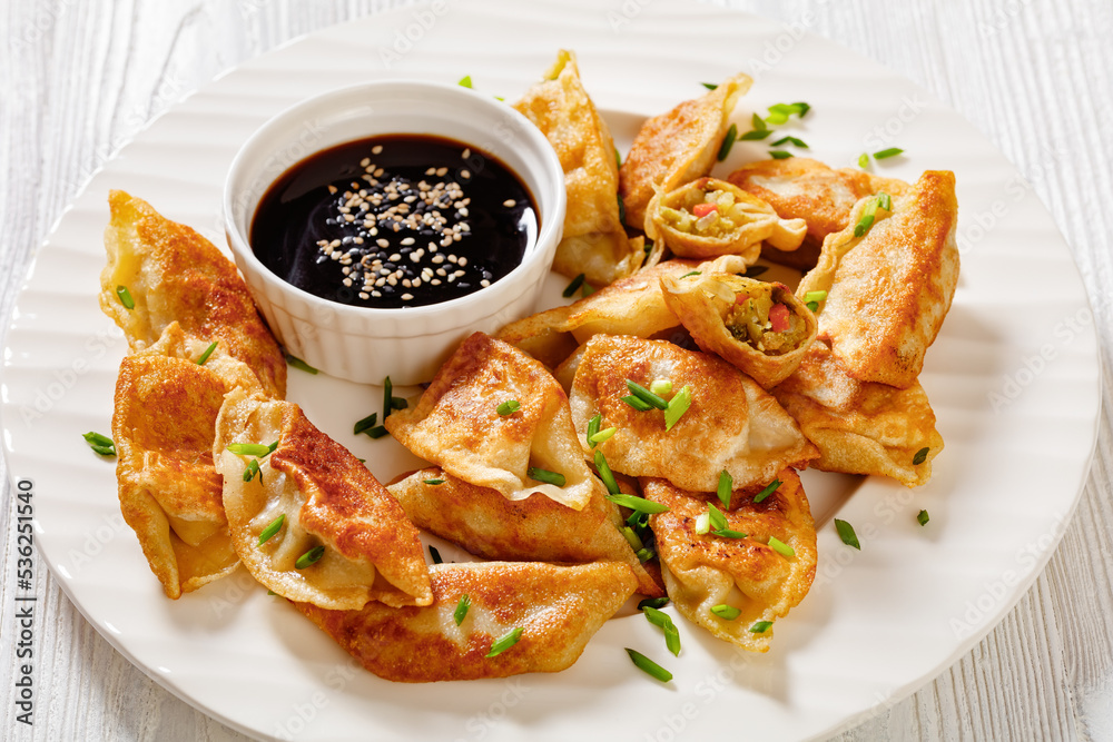 gyoza, wonton wrappers stuffed with pork, cabbage Stock Photo | Adobe Stock