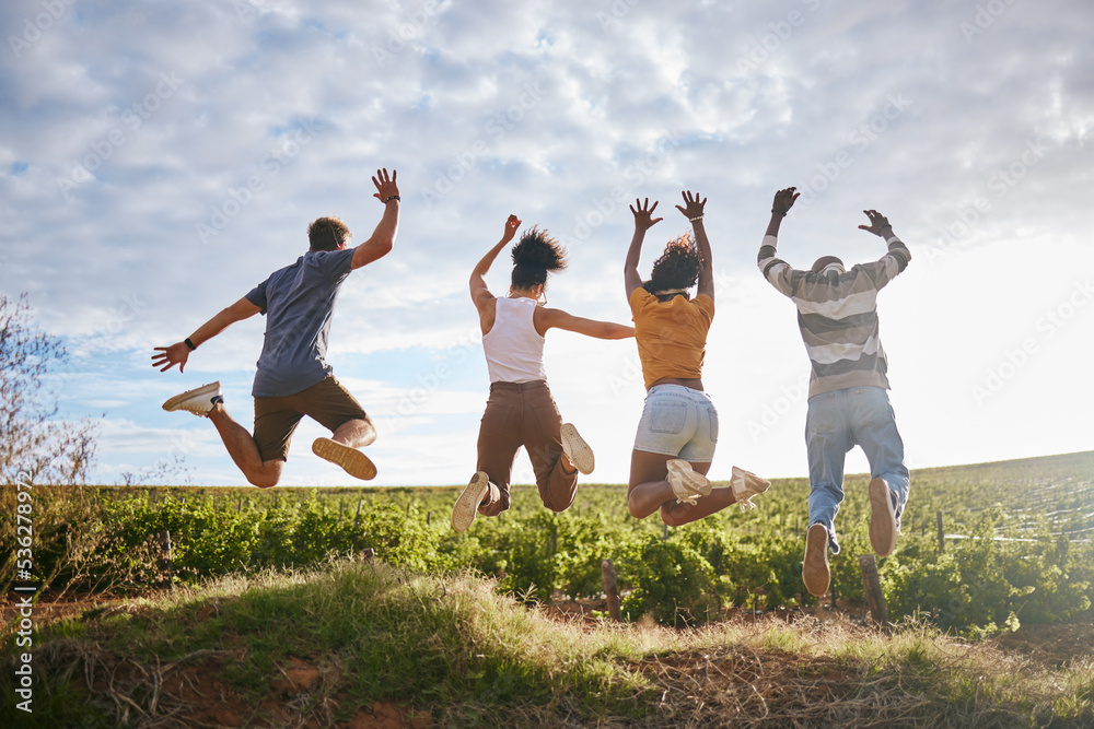 Friends, nature and jumping for freedom in the countryside for summer ...