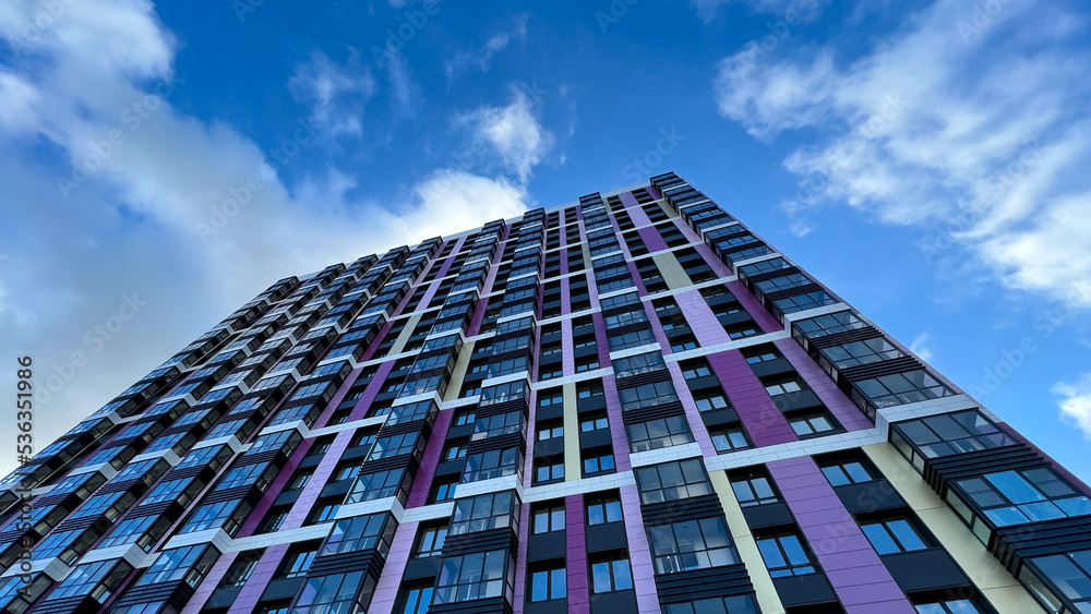 The facade of the building in purple,geometric patterns from windows ...