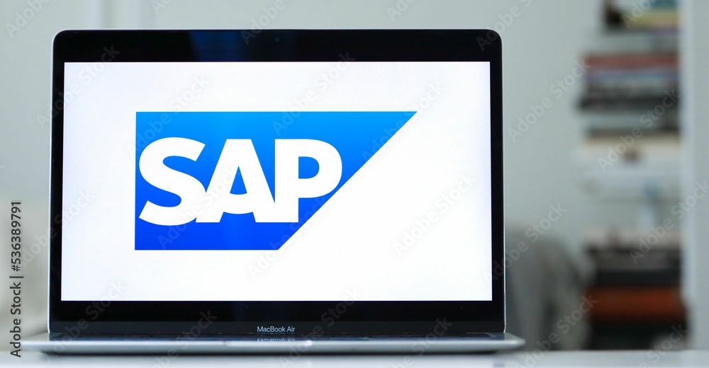 Logo design of SAP on a laptop screen in blurred background Stock Photo ...