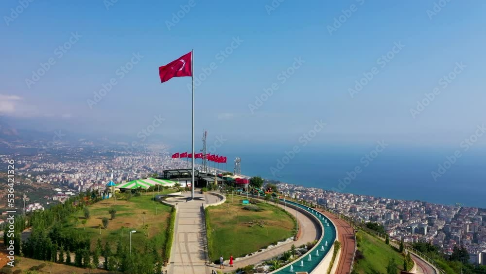 Turkish flag in the park of Alanya aerial shoot Stock Video | Adobe Stock