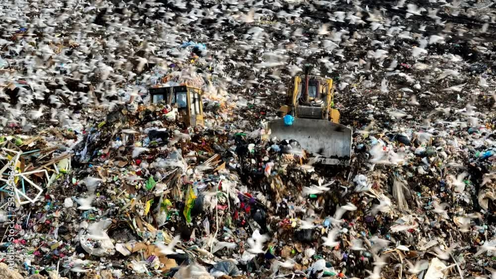 Dozer on Garbage Dump. Landfill with solid household waste, rubbish ...