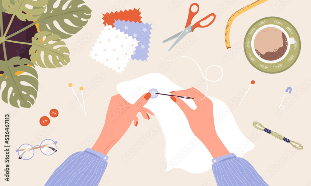 Female hands sew a button. Woman create outfit. Top view. Needlework ...