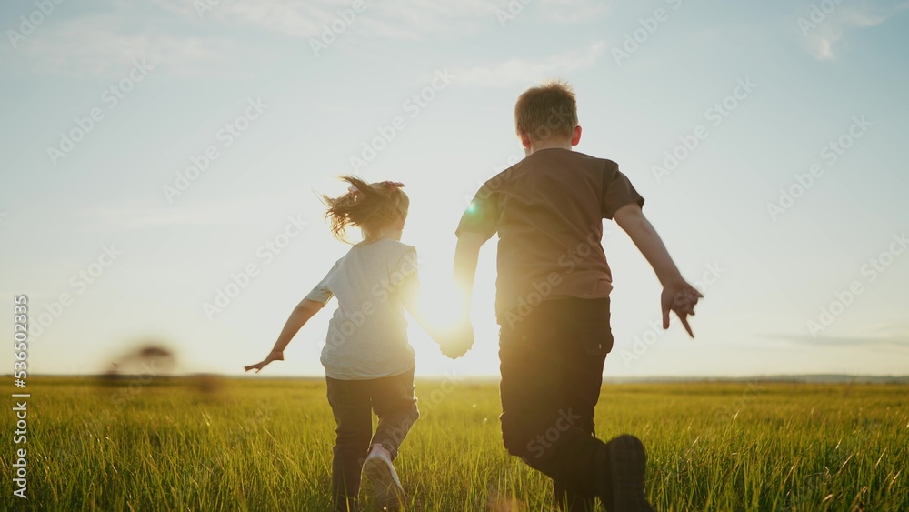 boy girl a running in the park. happy family kid dream holiday concept ...