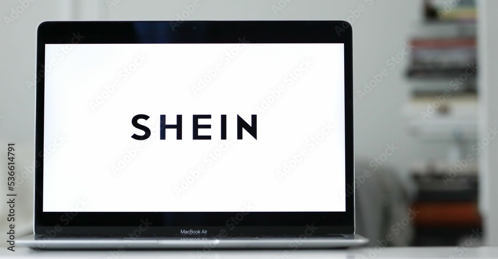 Logo of SHEIN, the world's largest fashion retailer and known for its ...