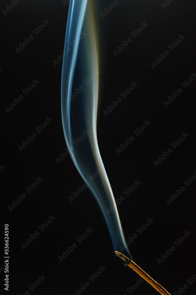 Trajectory of incense smoke in the air showing different shapes. Stock ...