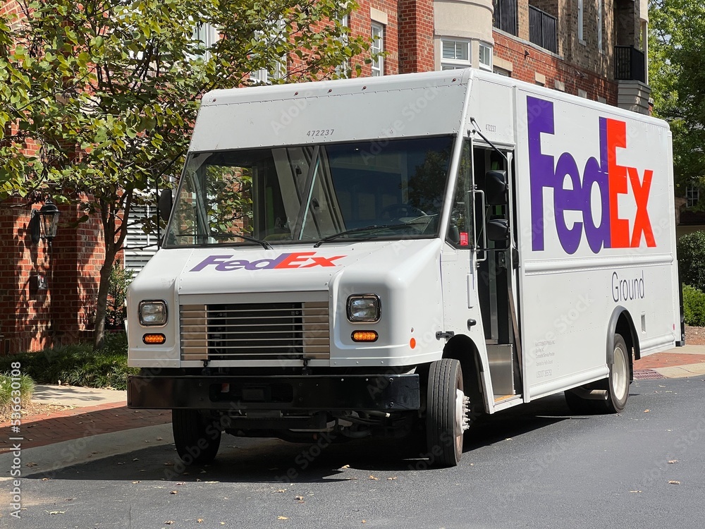 White iconic FedEx Ground white delivery truck Stock Photo | Adobe Stock