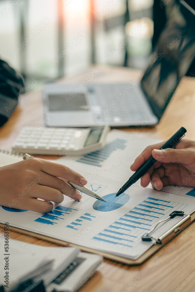 Teamwork concept, a group of business people meeting to analyze and ...