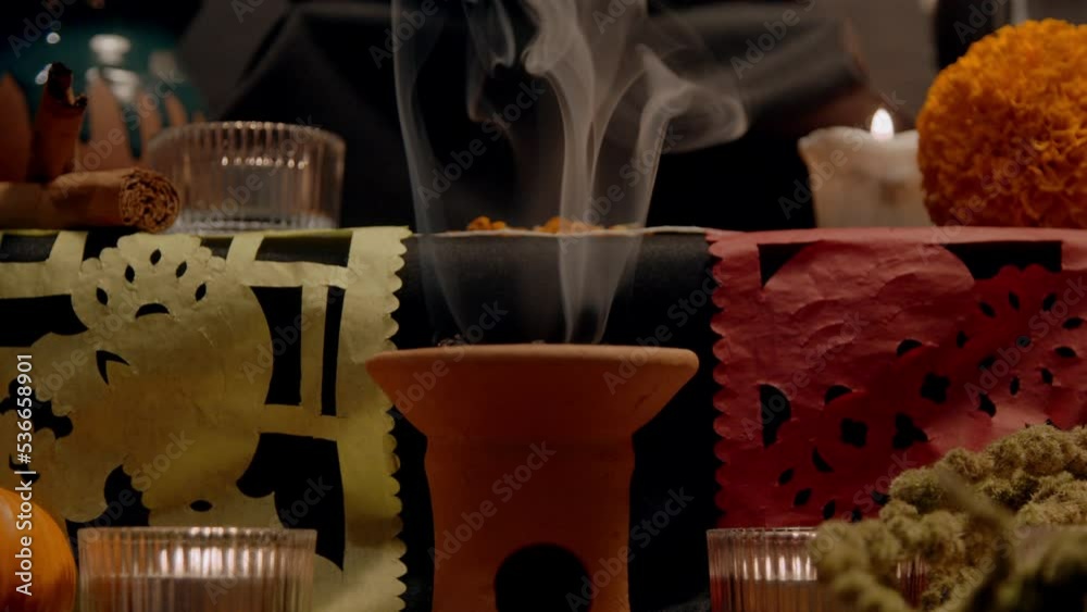 Traditional mexican bread of the dead "pan de muerto" with black ashes ...