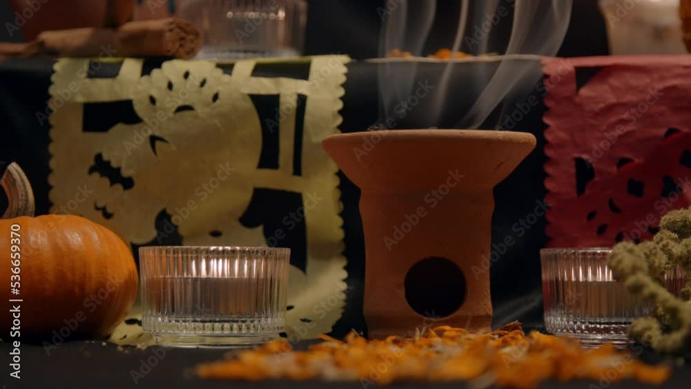 Traditional mexican bread of the dead "pan de muerto" with black ashes ...