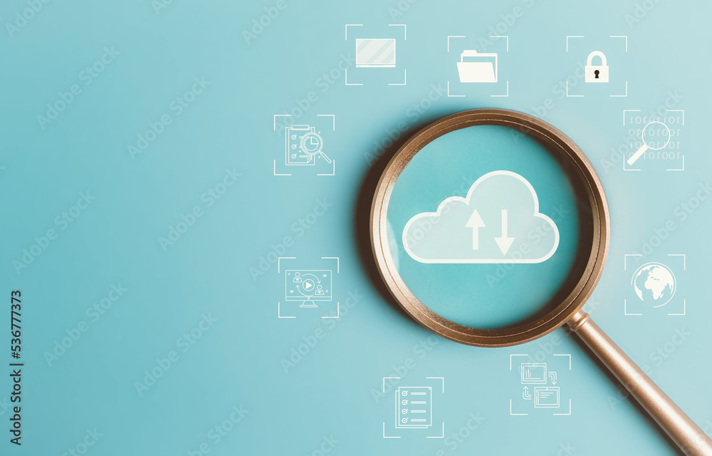 Cloud computing to upload data. Magnifier glass focus to cloud big data ...