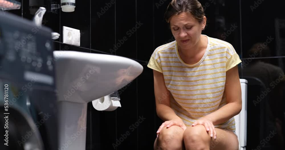 Vidéo Stock Unhealthy sick woman suffering from diarrhea, constipation ...