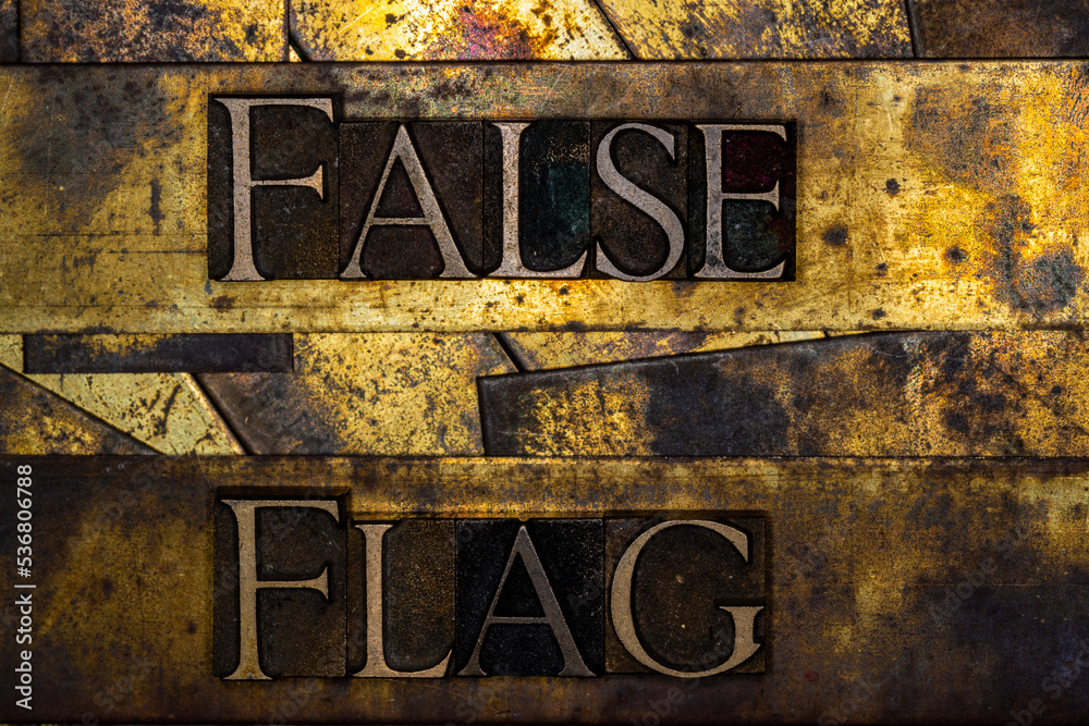 False Flag text on grunge textured copper and gold background Stock Illustration | Adobe Stock