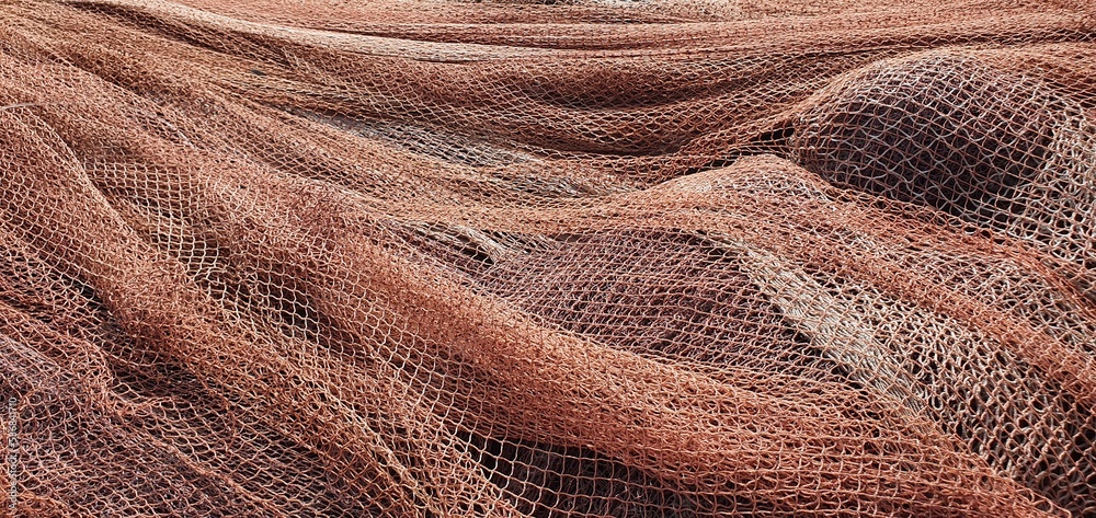 Fishing nets for catching fish in the sea and ocean. Fishing nets on a ...
