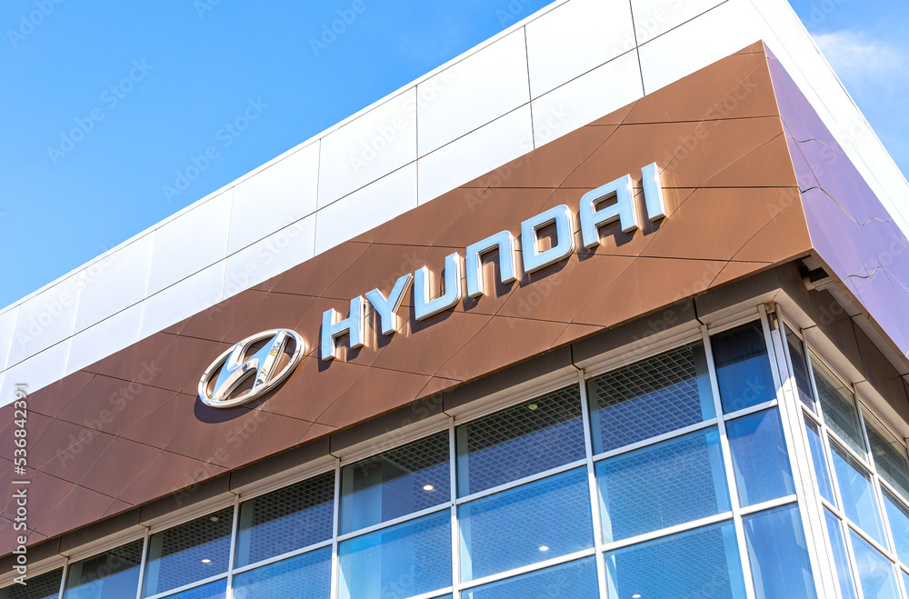 Hyundai logo on the facade dealership building Stock Photo | Adobe Stock