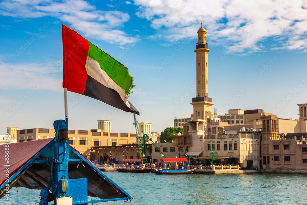 UAE flag and Abra boat in Dubai Stock Photo | Adobe Stock