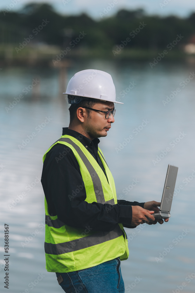 World environment day concept ,Thai Asian man engineering working with ...