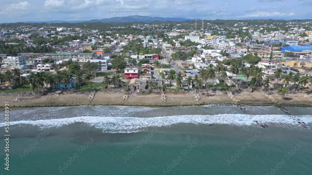 Ocean Waves Crashing On Malecon de Nagua Along The Seaside Village In ...