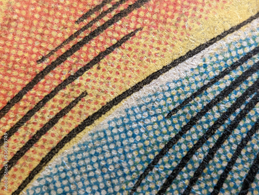 Closeup photo of real vintage comic book page with yellow red and blue ...