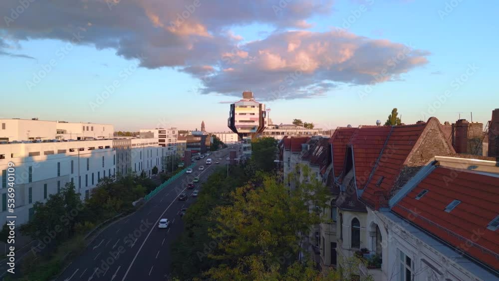 Pink cotton candy clouds over tower. Tranquil aerial view flight boom ...