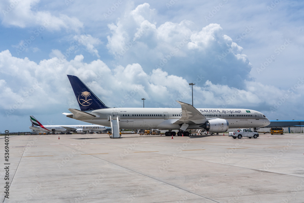 Malé, Maledives, October 2022, Saudia Boeing 787 and Emirates Boeing ...