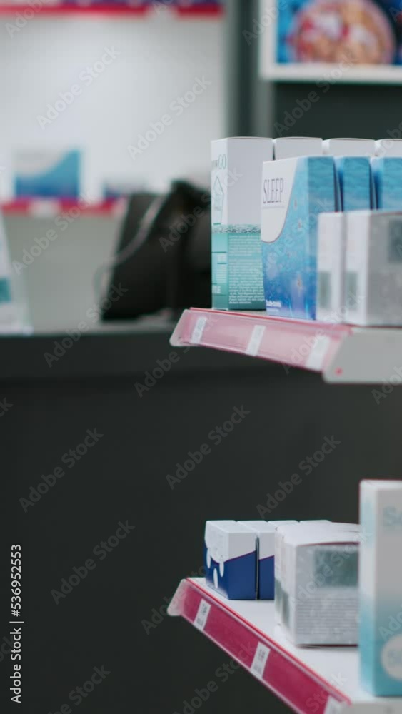 Vertical video: Empty pharmacy store with containers and packages on ...
