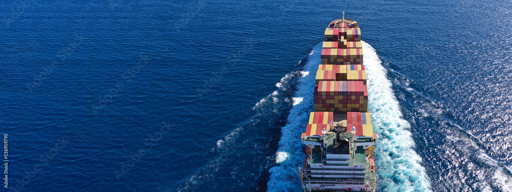 Aerial drone ultra wide top down photo of container cargo tanker ship ...