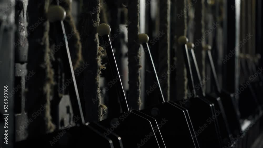 Manual system of lifting and lowering devices behind the scenes of the ...