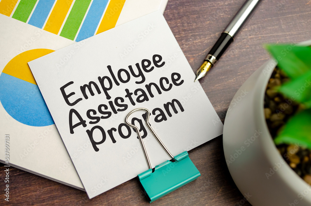 On a light background - light blue diagrams, paper clips and a sheet of ...