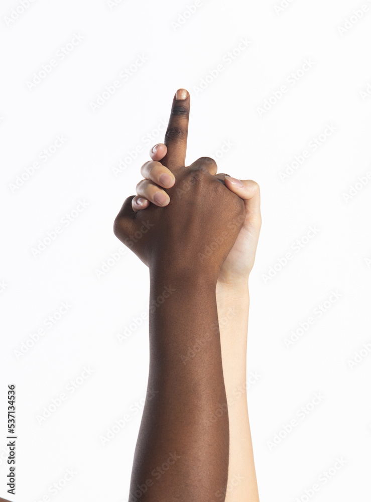 Multiethnic young women hold hands together finger up to be Number One ...