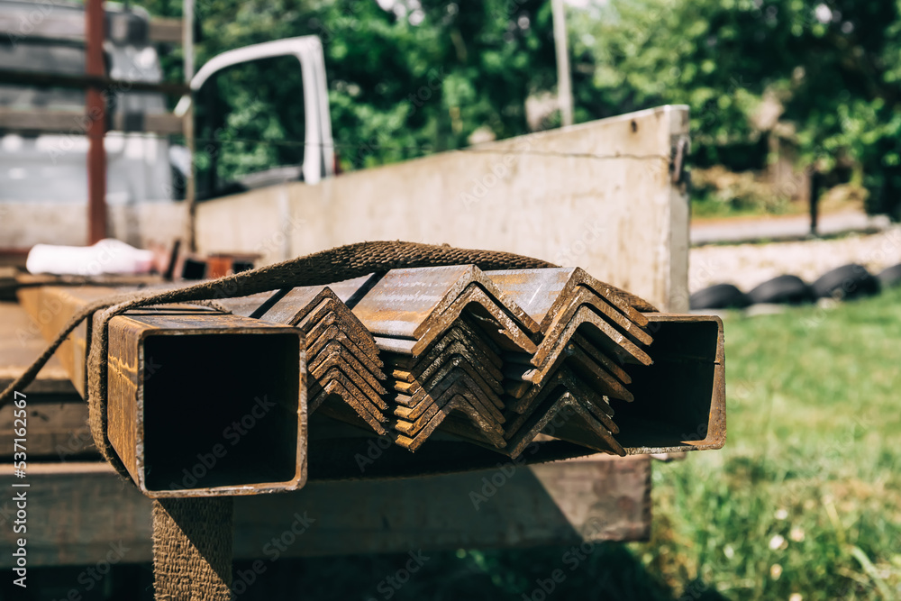 Steel profile tubes, corners and rods for the concrete reinforcing lies ...