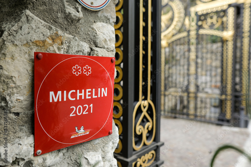Details with a 2 Michelin stars restaurant sign. Stock Photo | Adobe Stock