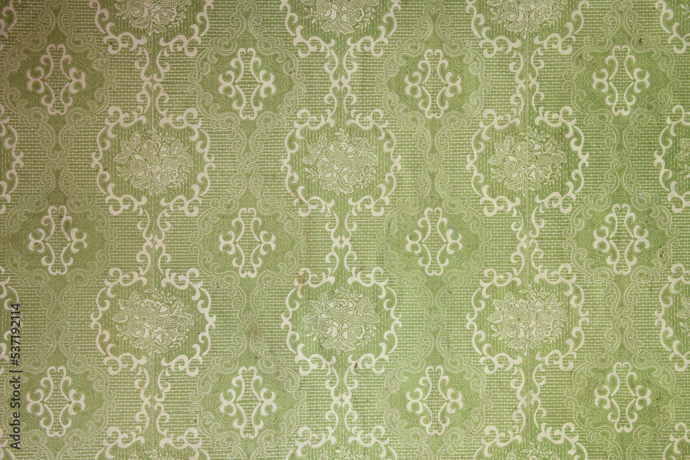 Old wallpaper on the wall. Old wallpaper for texture or background ...