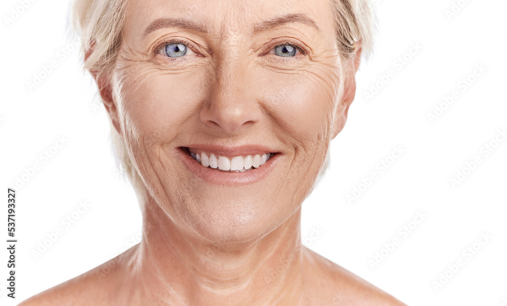 Closeup portrait of a beautiful older woman posing against a purple ...