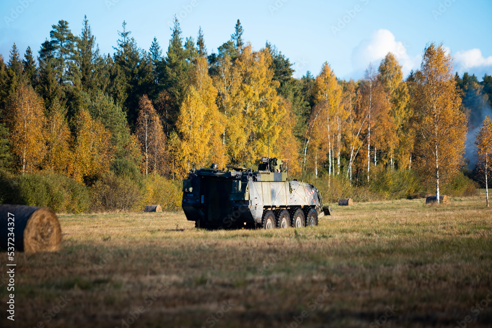 Military training on the battlefield with armored vehicles. Army war ...