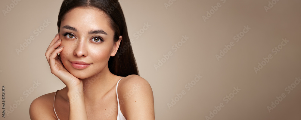 Portrait beautiful young woman with clean fresh skin. Model with ...