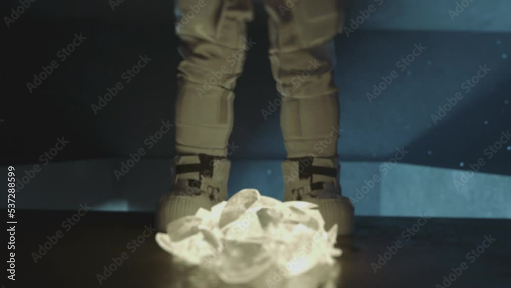 Close up of the moon falling crashing on the ground at the astronaut's ...