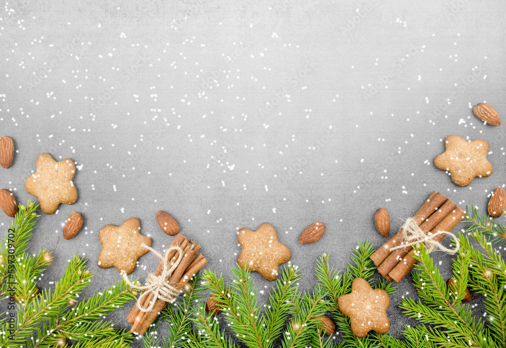 Christmas winter background. Spicy ginger cookies, pretzels, flour ...